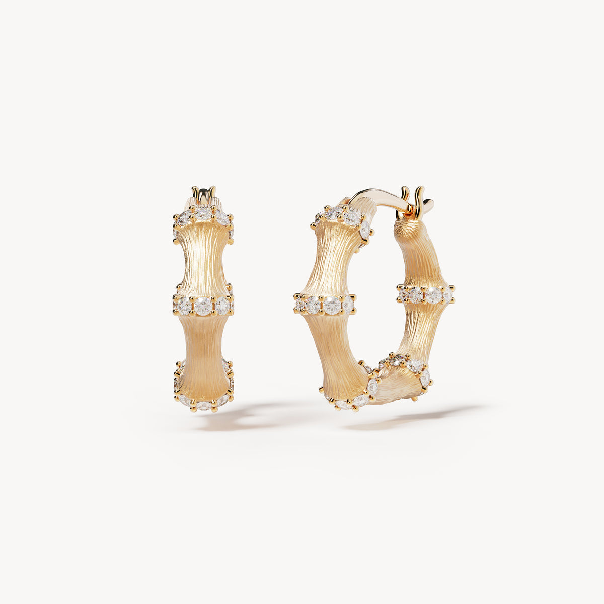 18k Gold Vermeil Intertwined Hoops – by charlotte