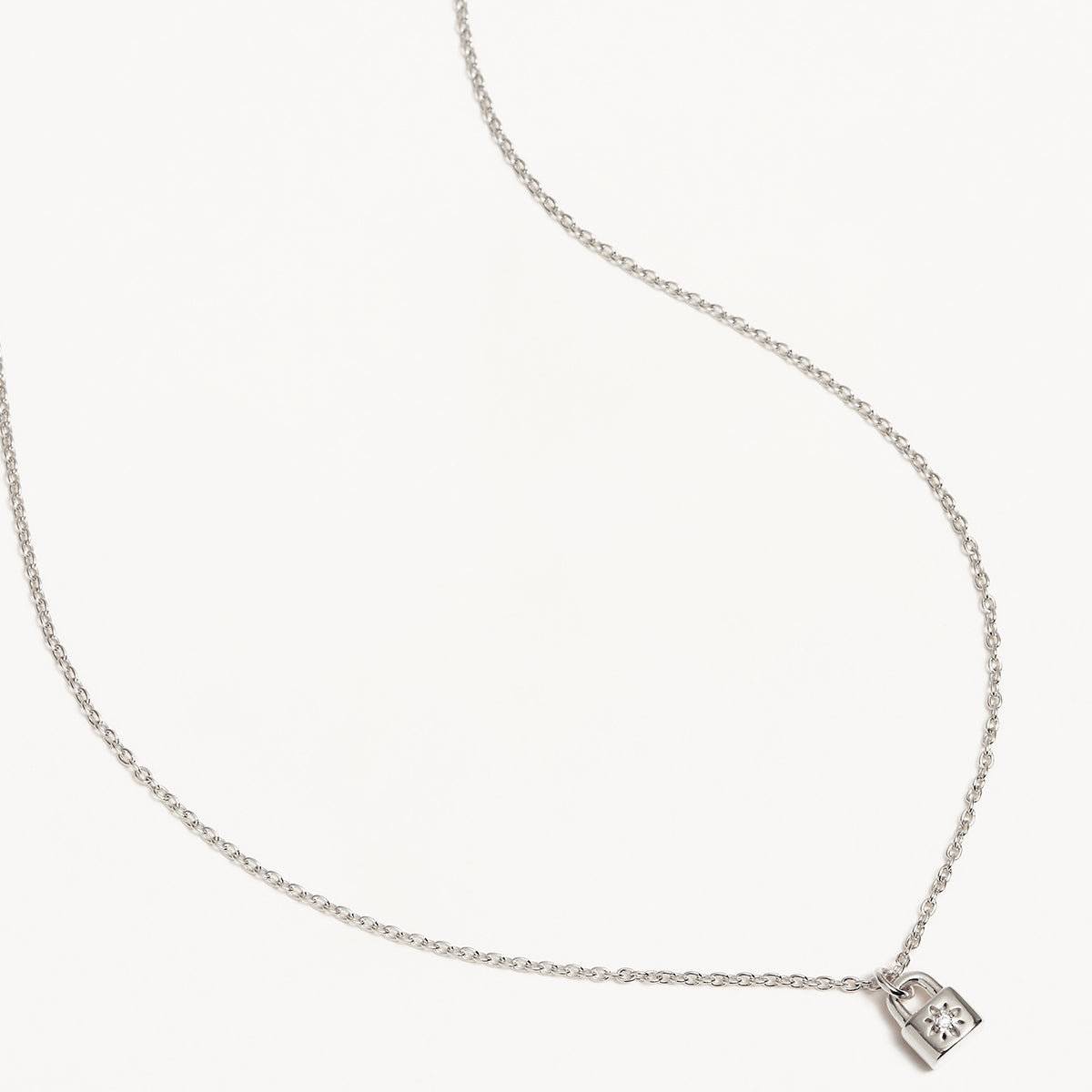 Sterling Silver Crystal Lotus Padlock Necklace – by charlotte
