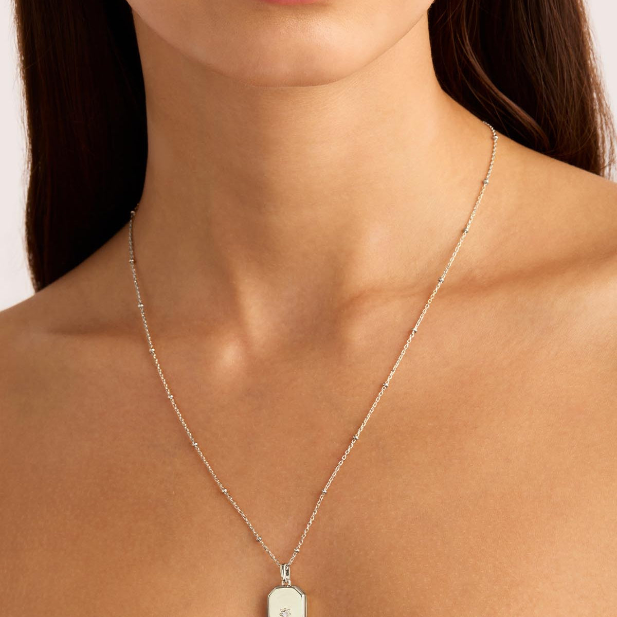 Sterling Silver Rectangular Lotus Locket Pendant – by charlotte